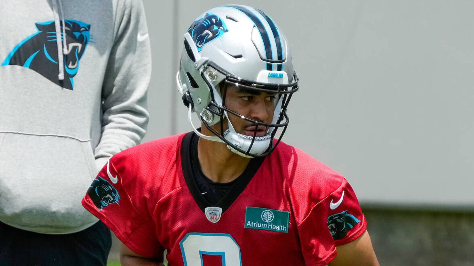 Panthers' Bryce Young looks small in first snaps as NFL quarterback ...
