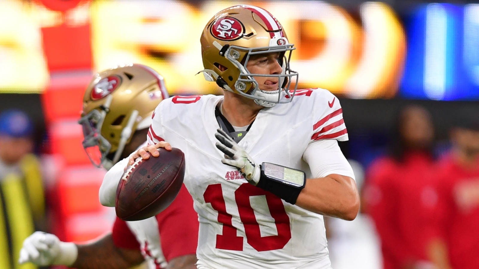 Mac Jones injury update: 49ers QB takes massive hit vs. Rams, grabs ...