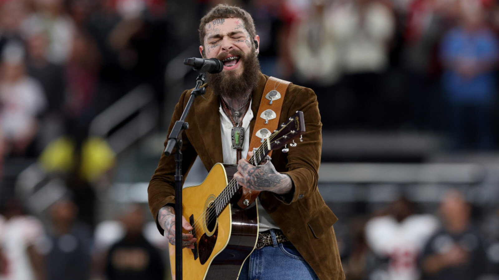 Post Malone tips 'life-changing' $20k tip to struggling bartender ...