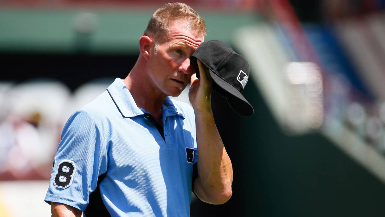 MLB ump Jim Wolf’s jacked arms compare to Ed Hochuli's | Yardbarker.com