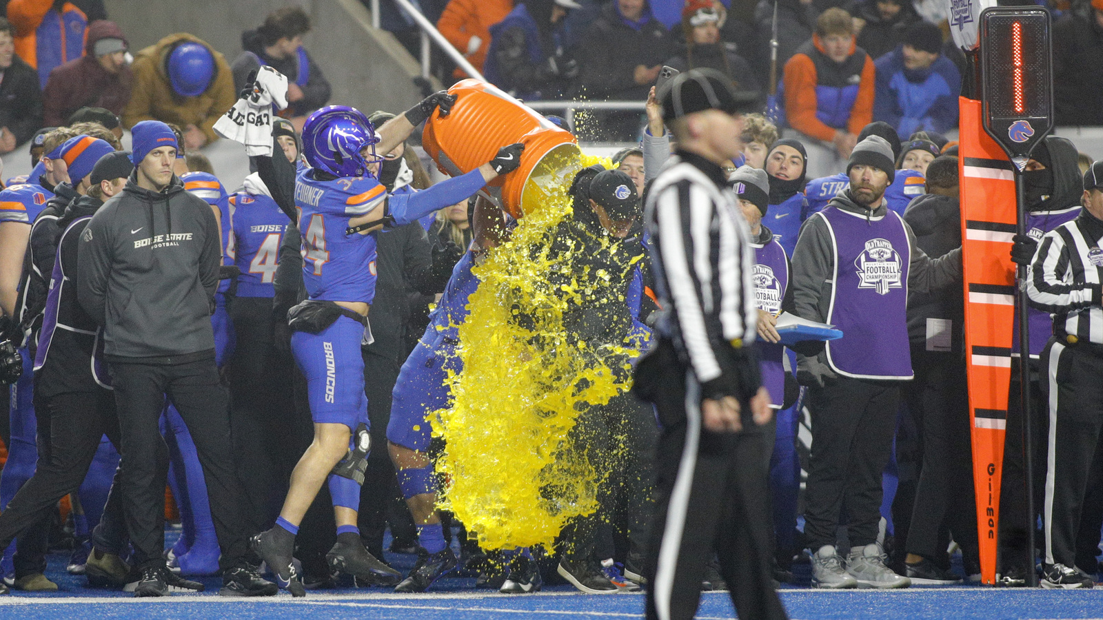 Watch: Boise State fans baptize goal post after Broncos secure CFP spot ...