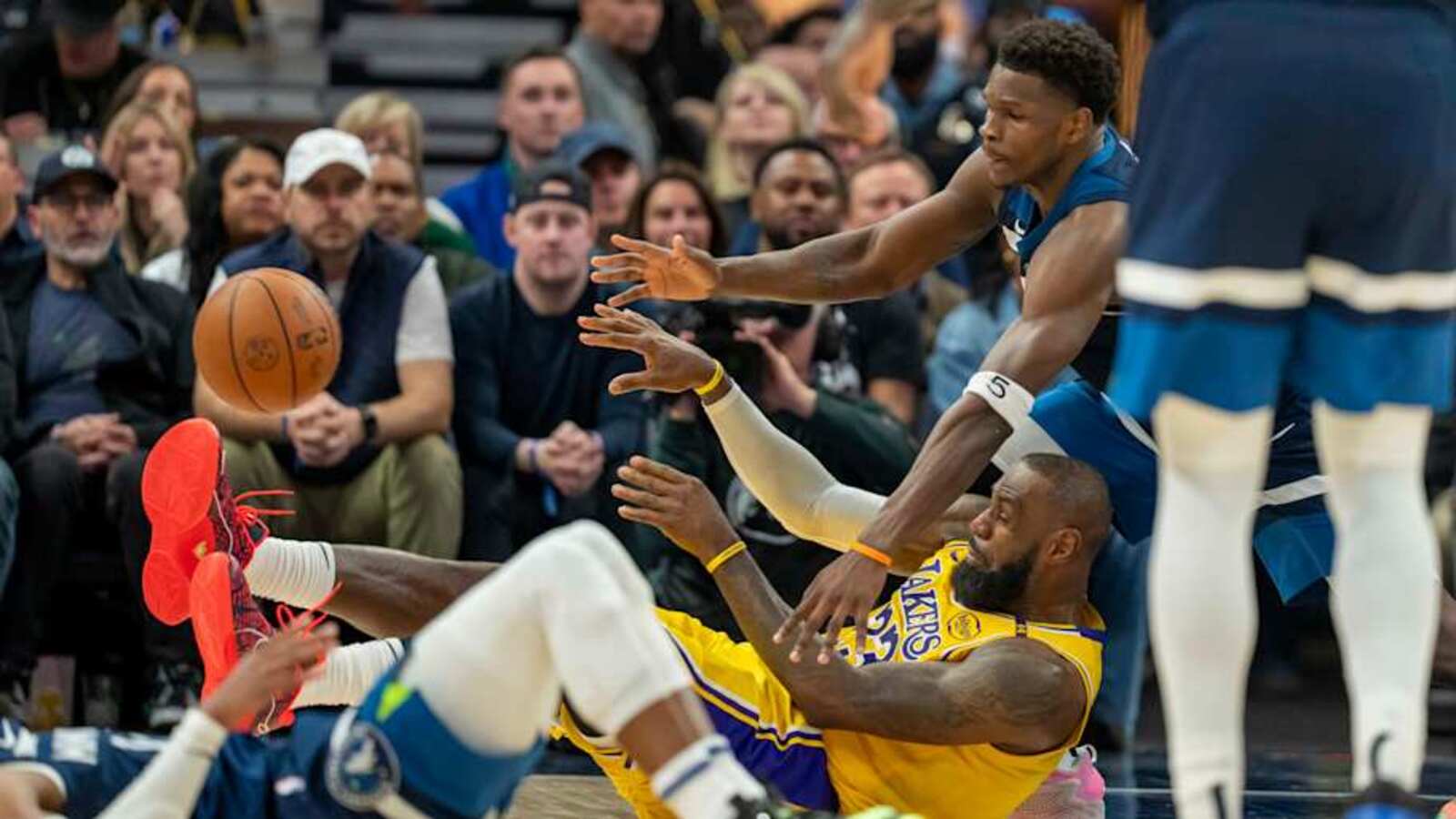 Watch: Anthony Edwards injury scare after LeBron James falls on his leg ...