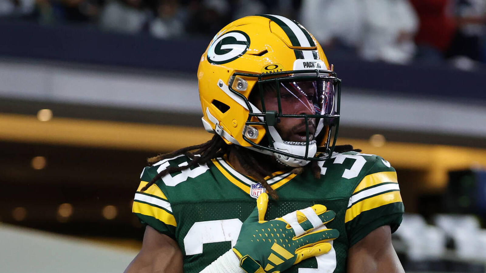 Watch: Packers RB Aaron Jones gets stitched up on sidelines | Yardbarker