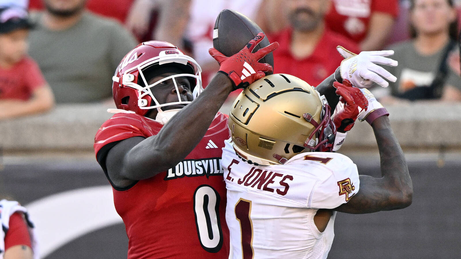 Watch: Louisville WR Chris Bell fights through interference to make ...