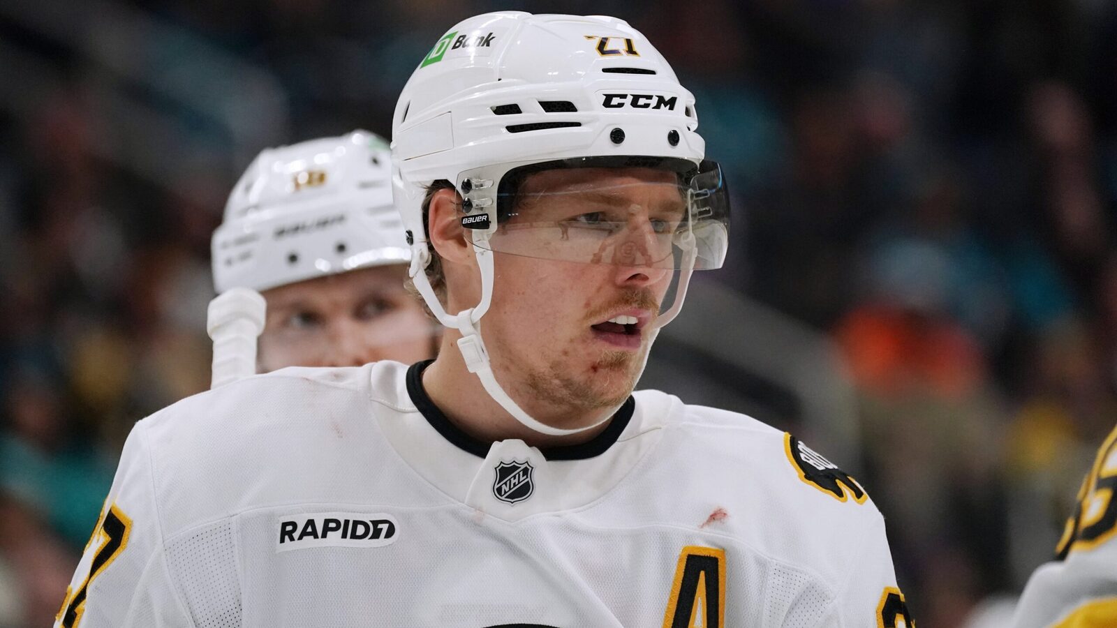 Bruins’ Elias Lindholm leaves game vs. Rangers with lower-body injury ...
