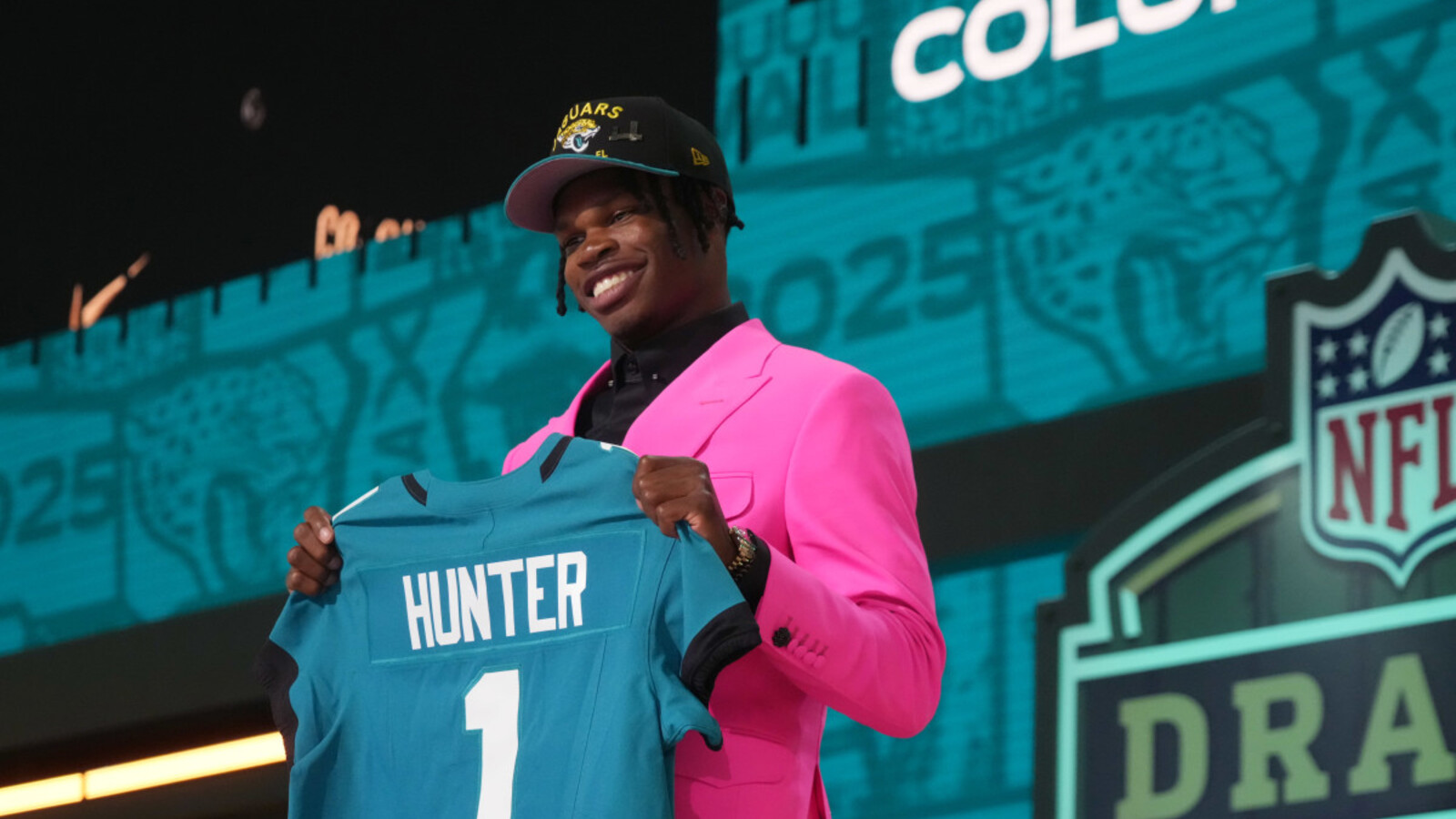 Deion Sanders reacts to Travis Hunter's big moment at NFL Draft ...