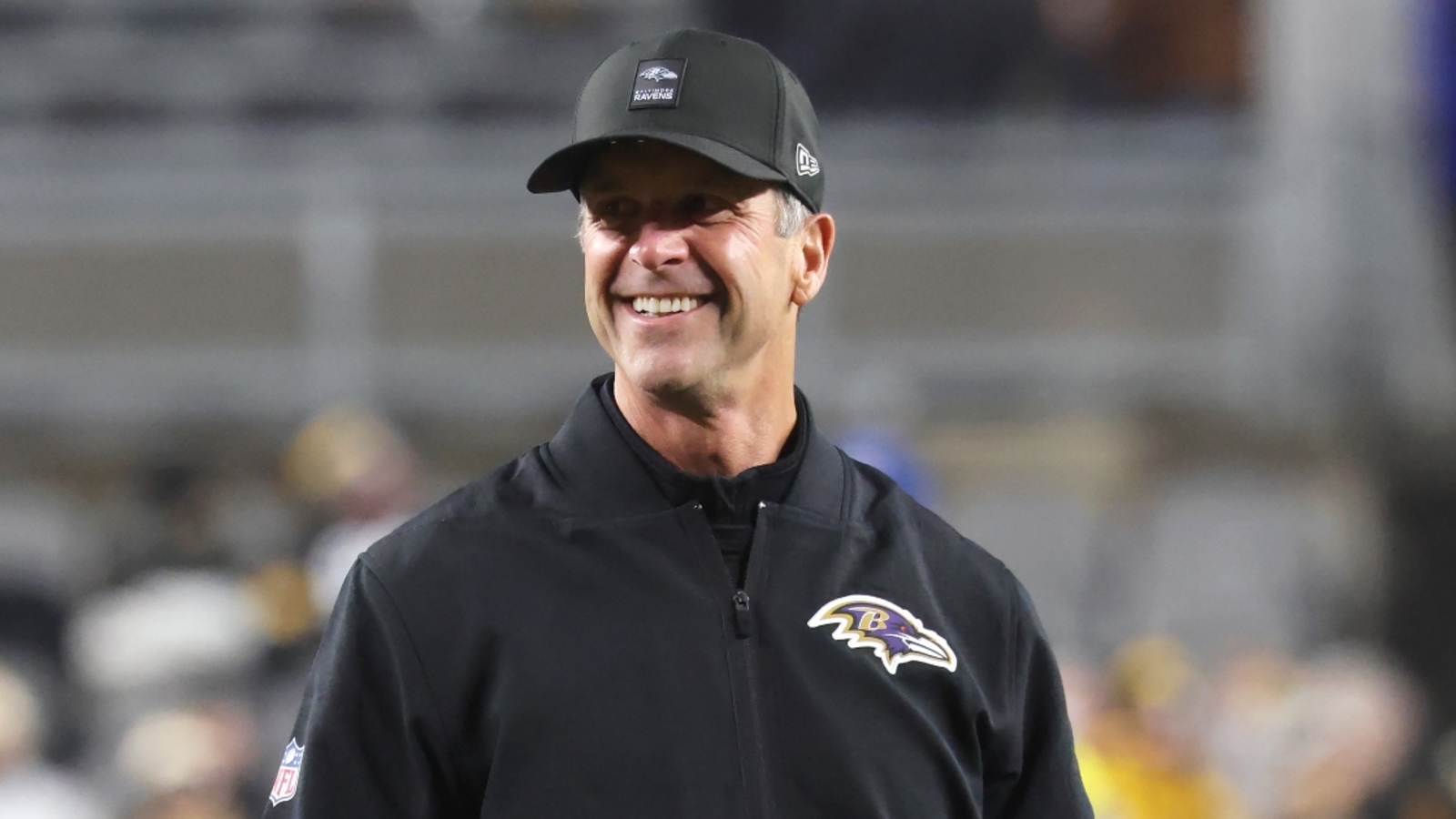 Adam Schefter shoots down report suggesting rift between John Harbaugh ...