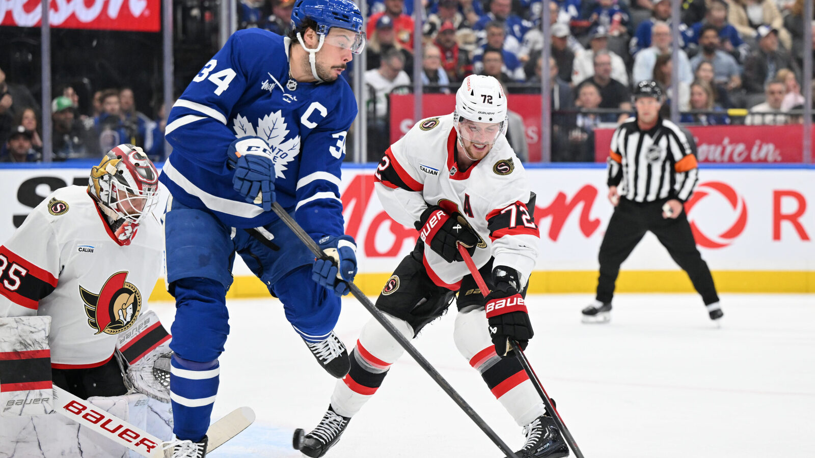 Maple Leafs clinch Atlantic Division title, will face Senators in first ...