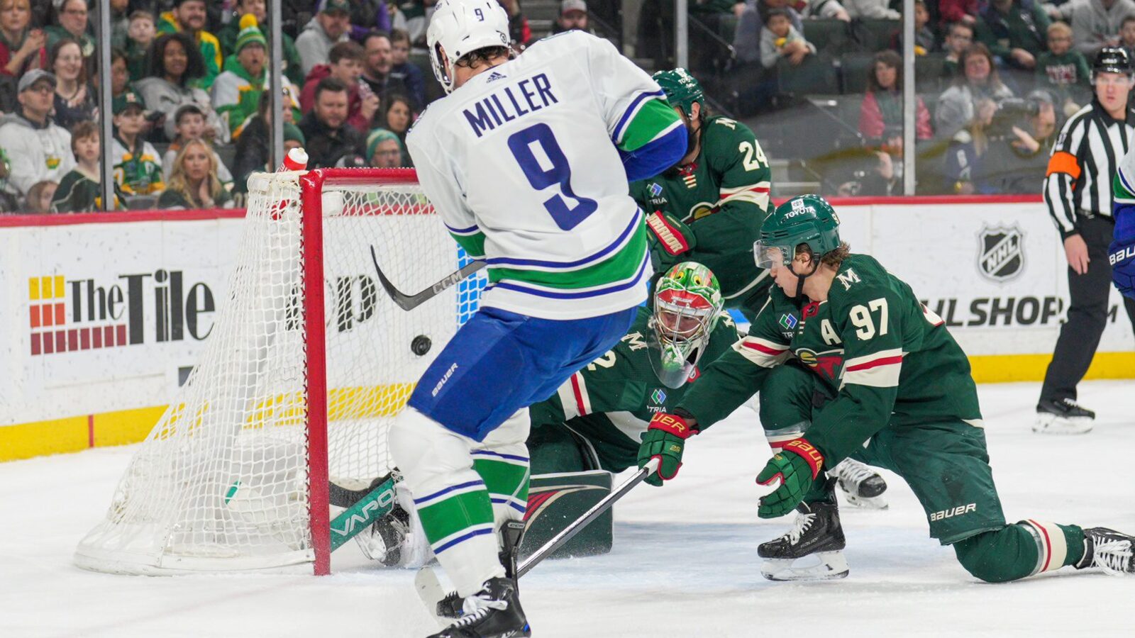 Wild, Canucks deliver NHL’s first three-hat-trick game since 1992 ...