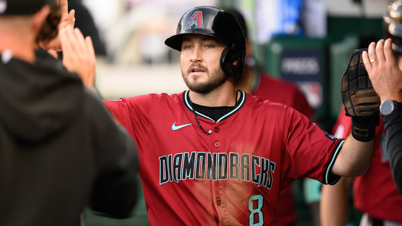 Reds sign veteran utilityman Garrett Hampson to big league deal ...