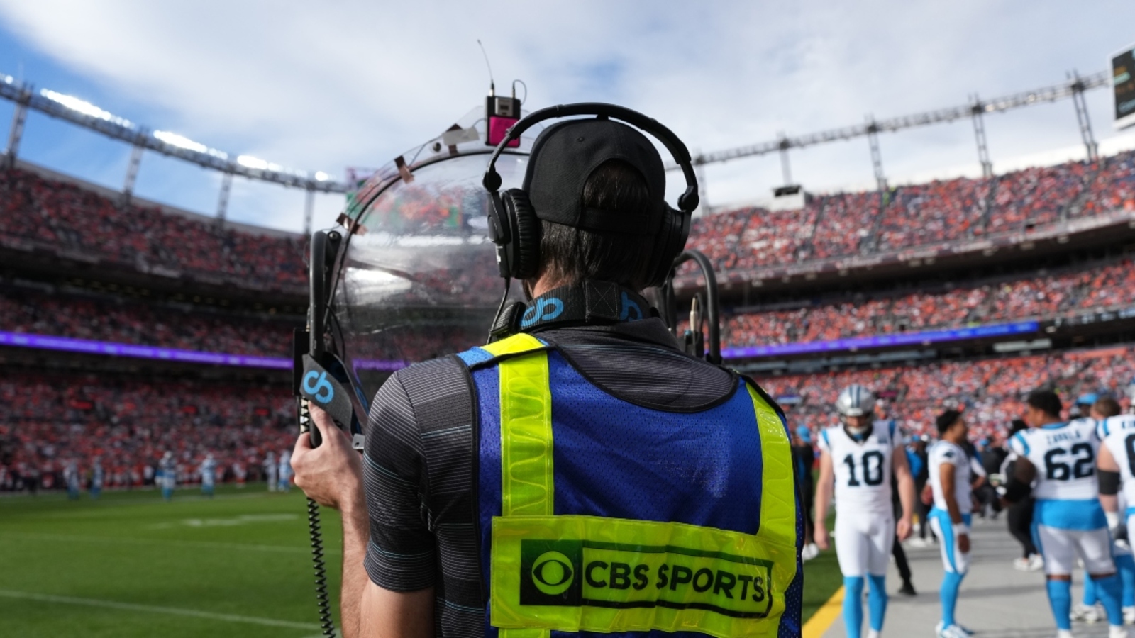 Former acting CIA Director operating sideline microphone during Browns ...