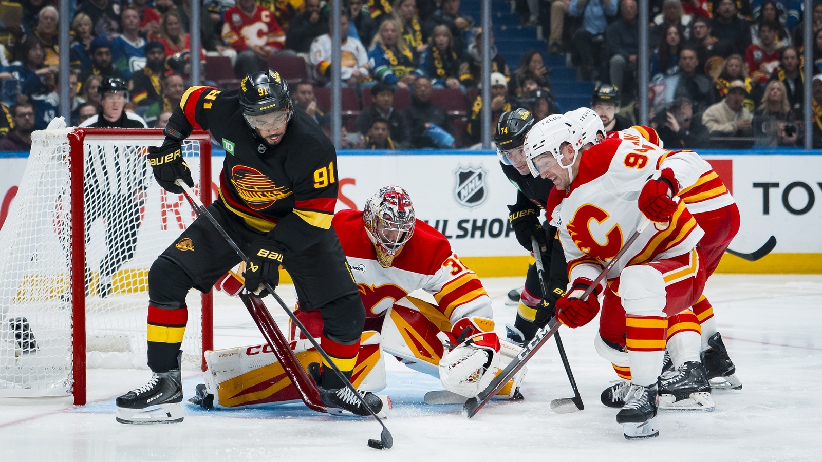 Instant Reaction: Flames fade in loss to Canucks | Yardbarker