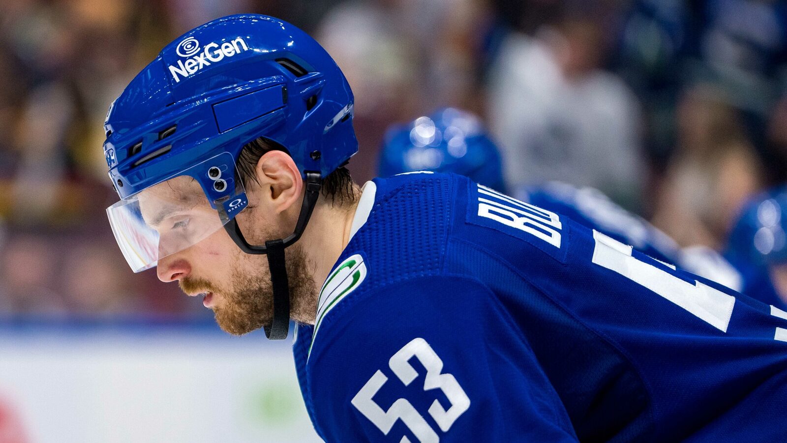 Canucks forward Teddy Blueger skates in no-contact jersey at training ...