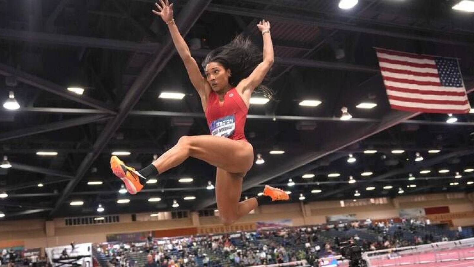 Former Georgia, Texas star Tara Davis-Woodhall claims gold in long jump ...