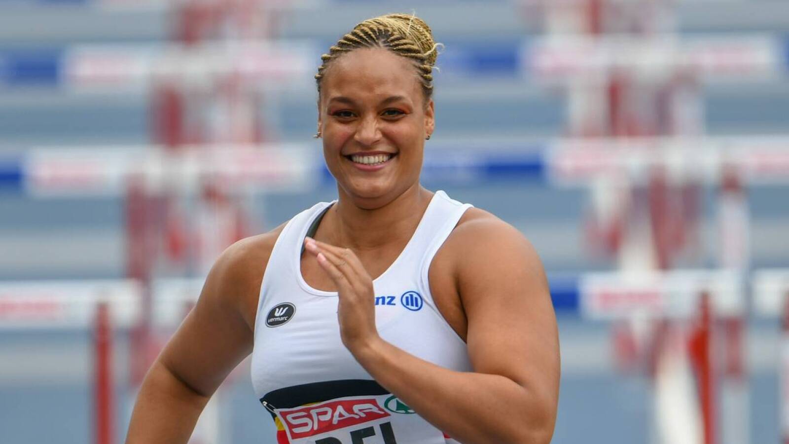 Belgium shot put champ saves team by running hurdles | Yardbarker