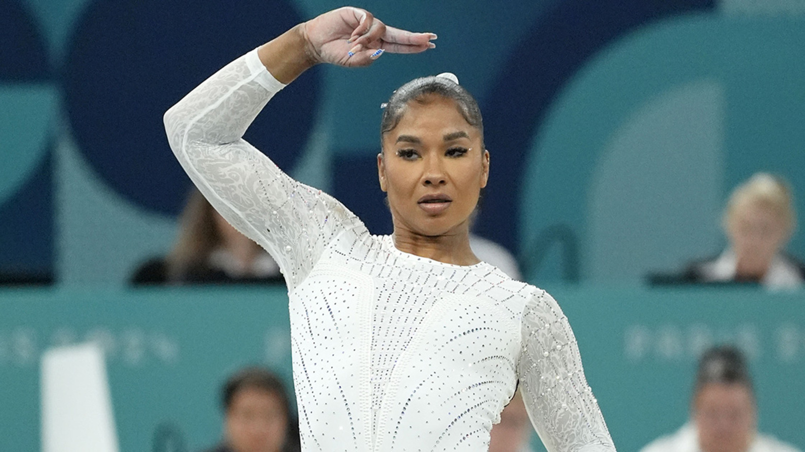 Flavor Flav bestows bronze clock necklace to Jordan Chiles after loss ...