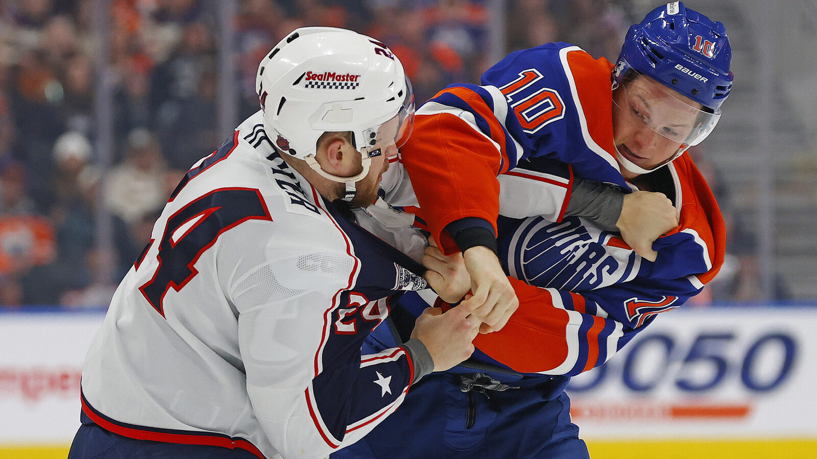 Oilers’ first fight of the season sees Trent Frederic bloodied by ...
